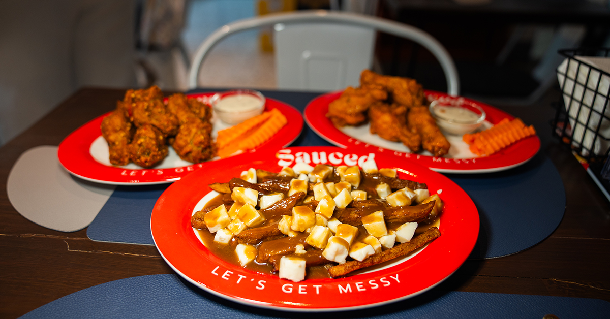 Caesars, wings, and poutine at new Canadian spot Sauced in Onnut - BK ...